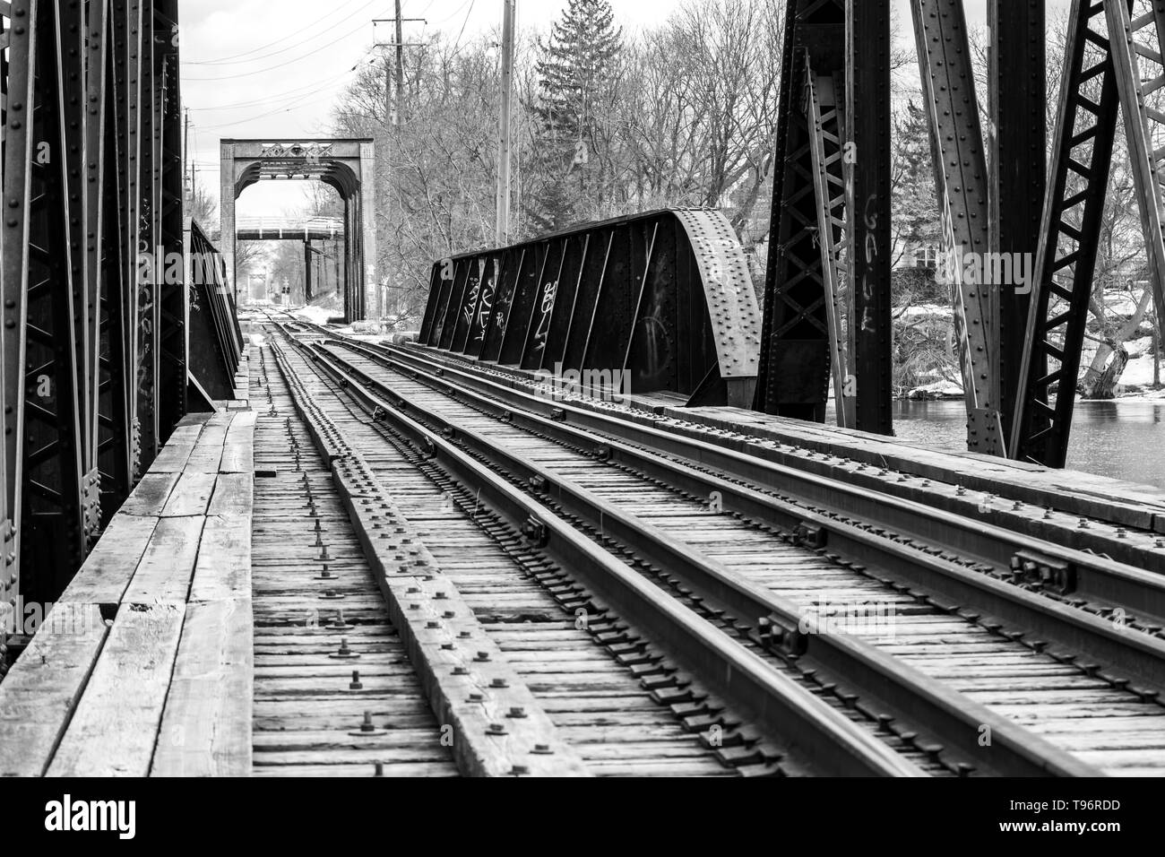 Railway tracks leading to bridge Stock Photo - Alamy