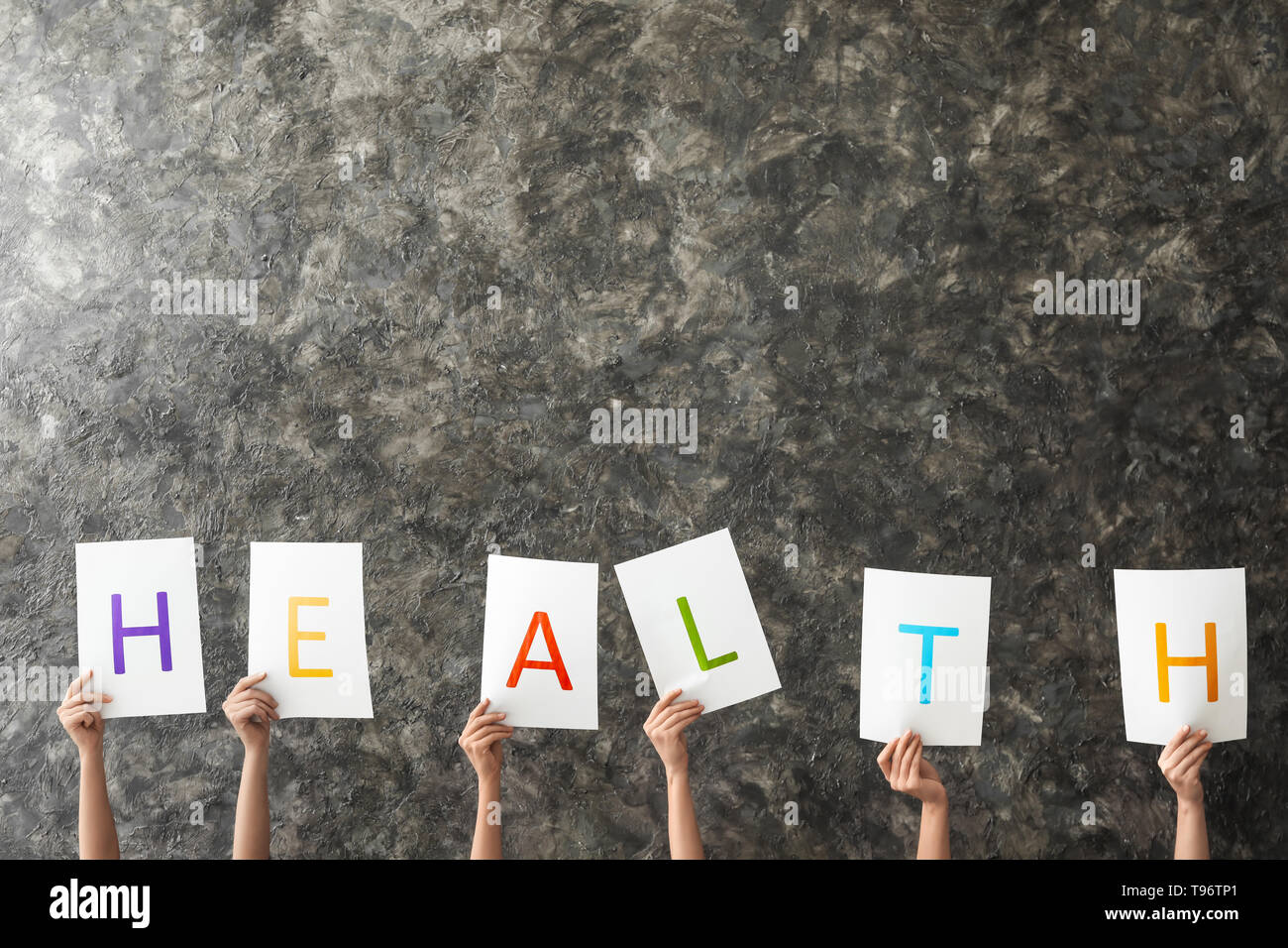 People holding word hands letters hi-res stock photography and images ...