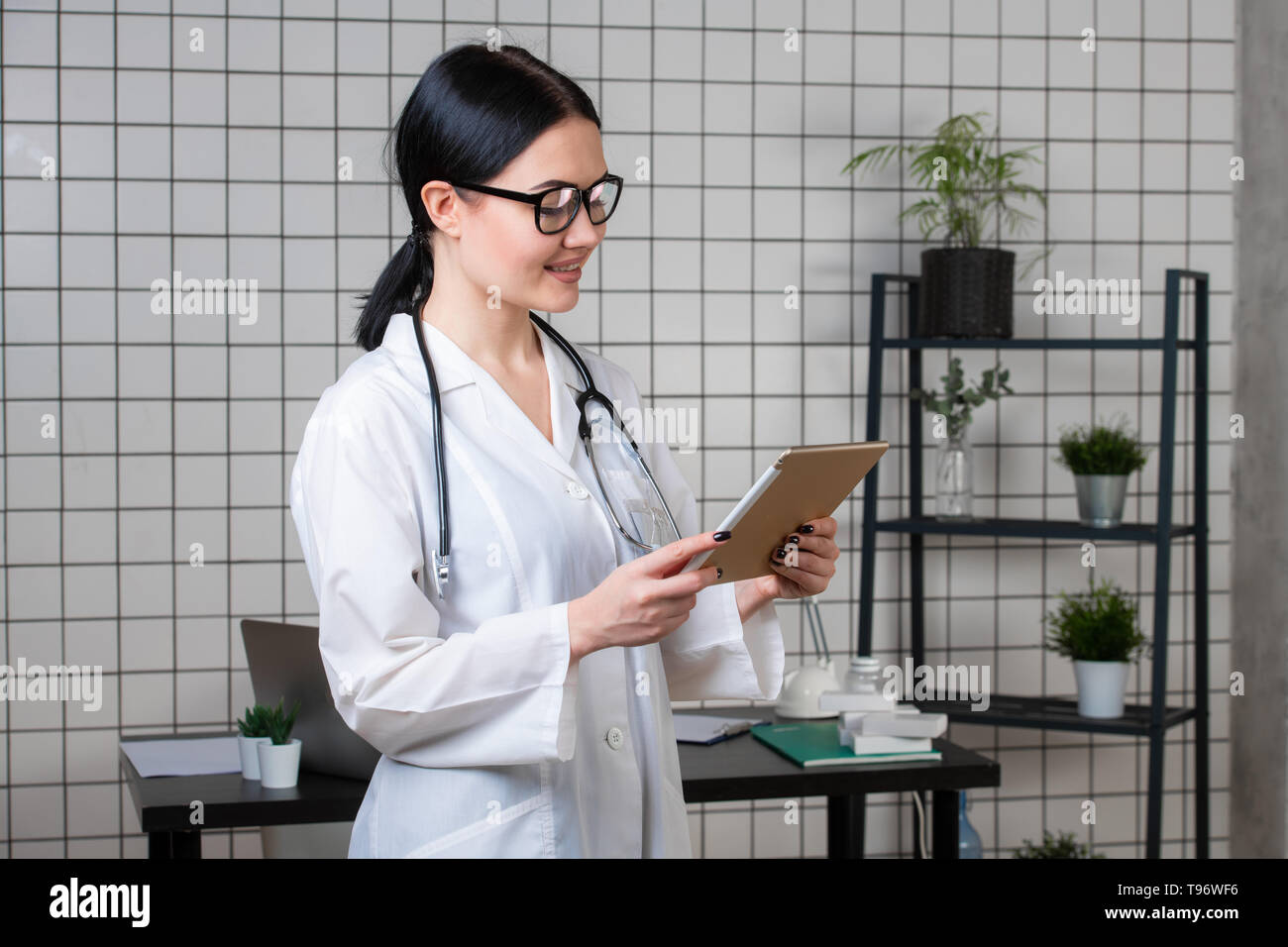 Female nurse isolated white scrubs pretty young caucasian hi-res stock ...