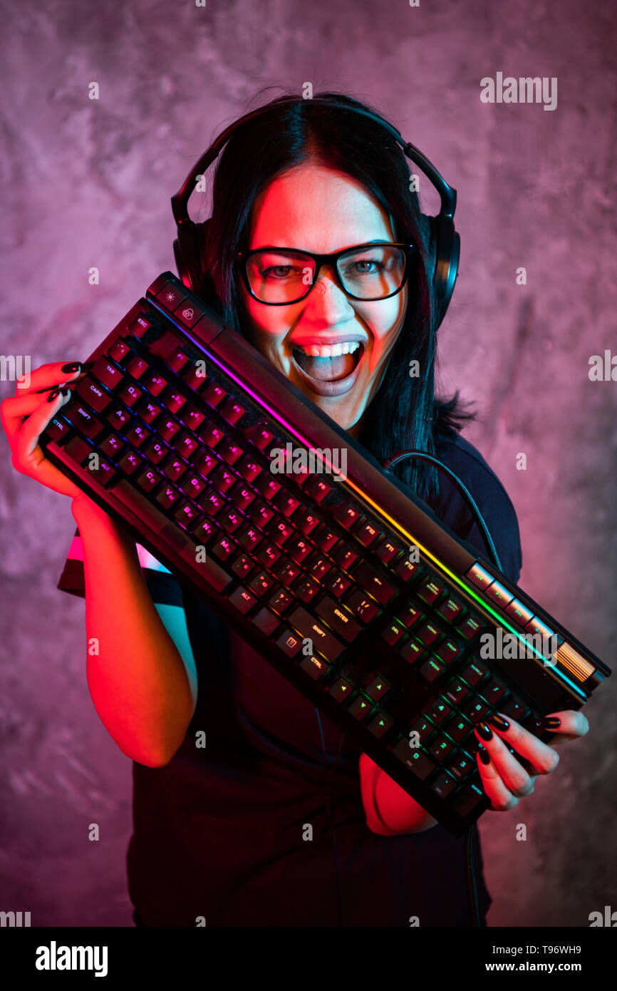 Beautiful Professional Gamer Girl With Keyboard. Casual Cute Geek ...