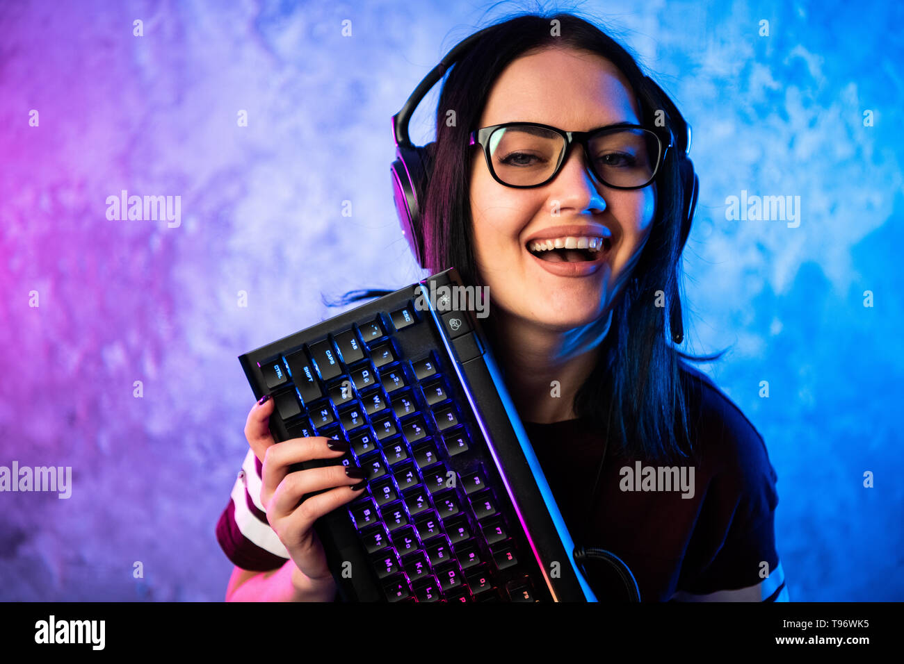 Beautiful Friendly Pro Gamer Streamer Girl Posing With a Keyboard in ...