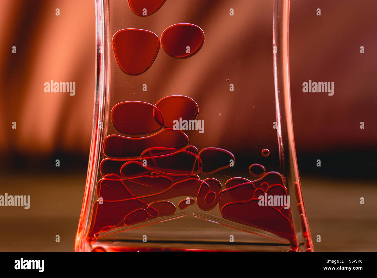 Red drops similar to blood falling in water Stock Photo - Alamy