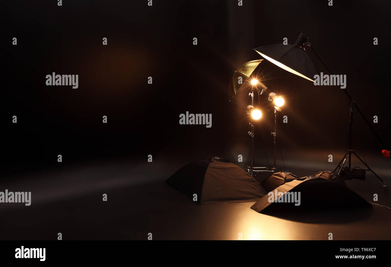 Interior of modern photo studio with professional lighting equipment ...