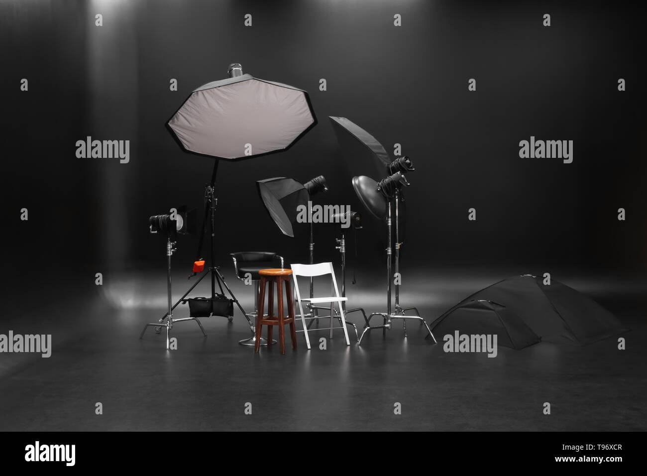 Professional lighting equipment on dark background Stock Photo - Alamy