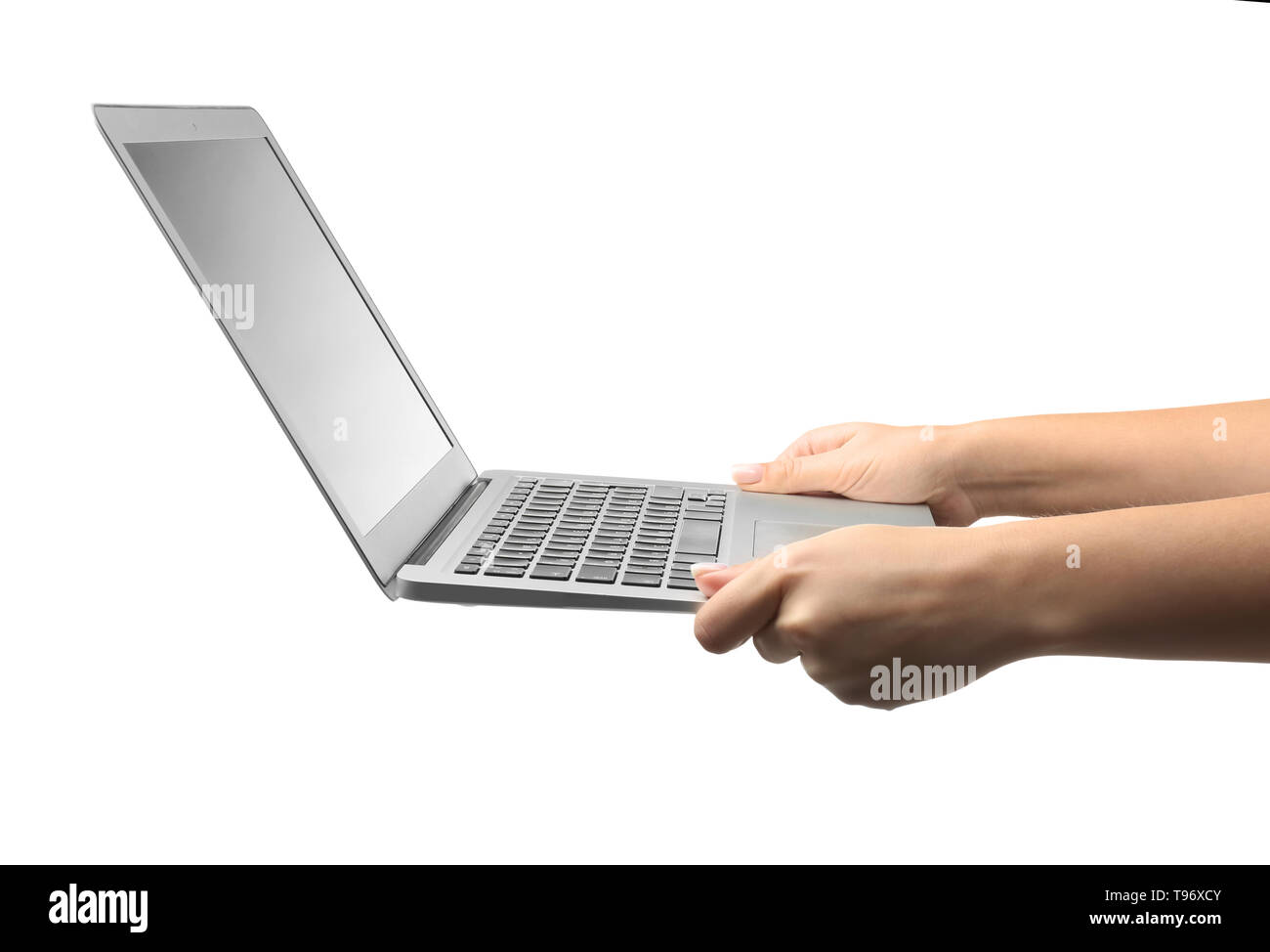 Female hands holding laptop on white background Stock Photo - Alamy