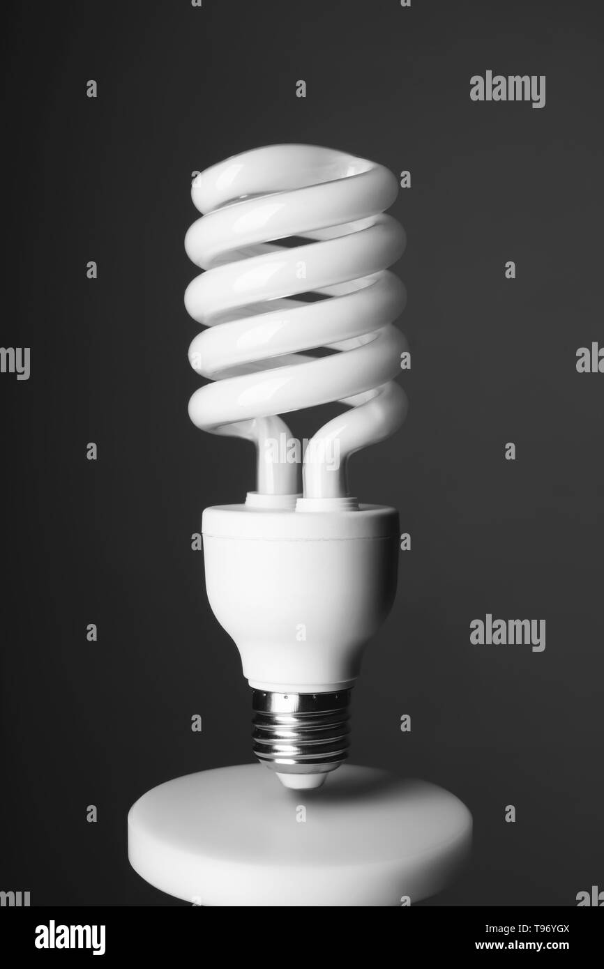 Modern light bulb on dark background Stock Photo - Alamy