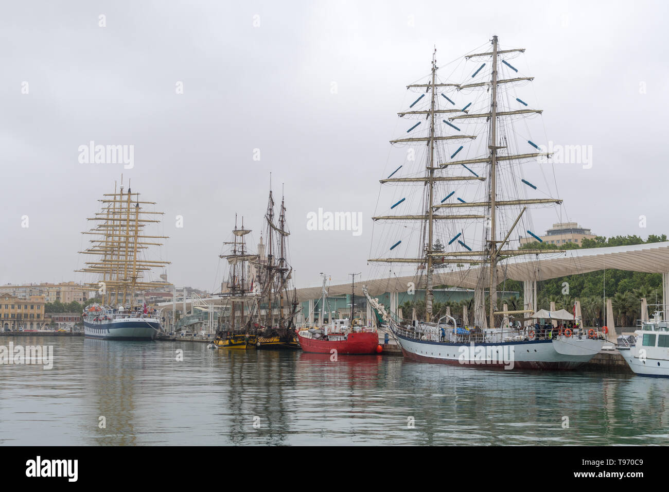 Multi-mast sailing ships at the pier in the port Stock Photo - Alamy