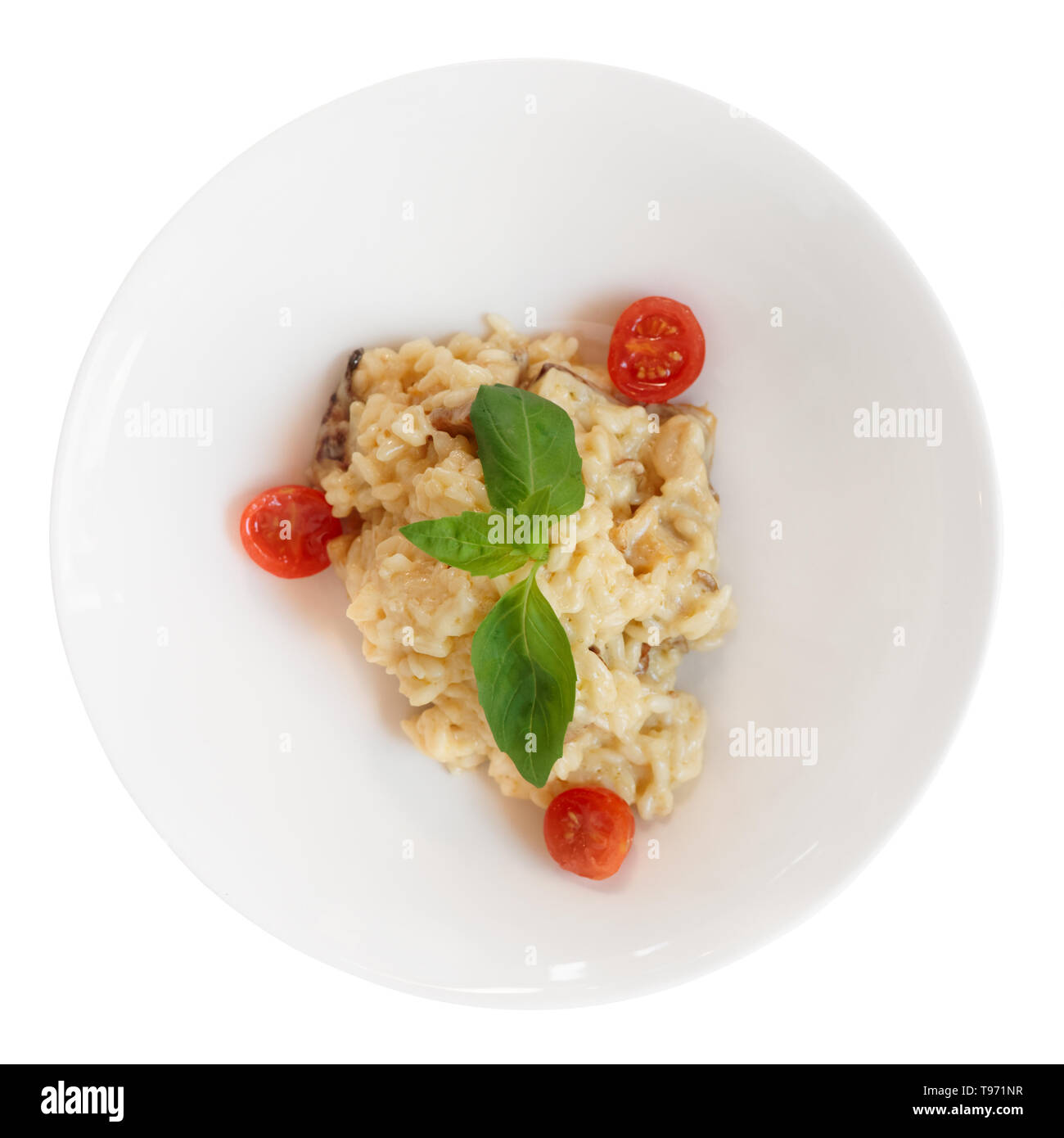 Creamy risotto in porcelain plate isolated on white background Stock ...