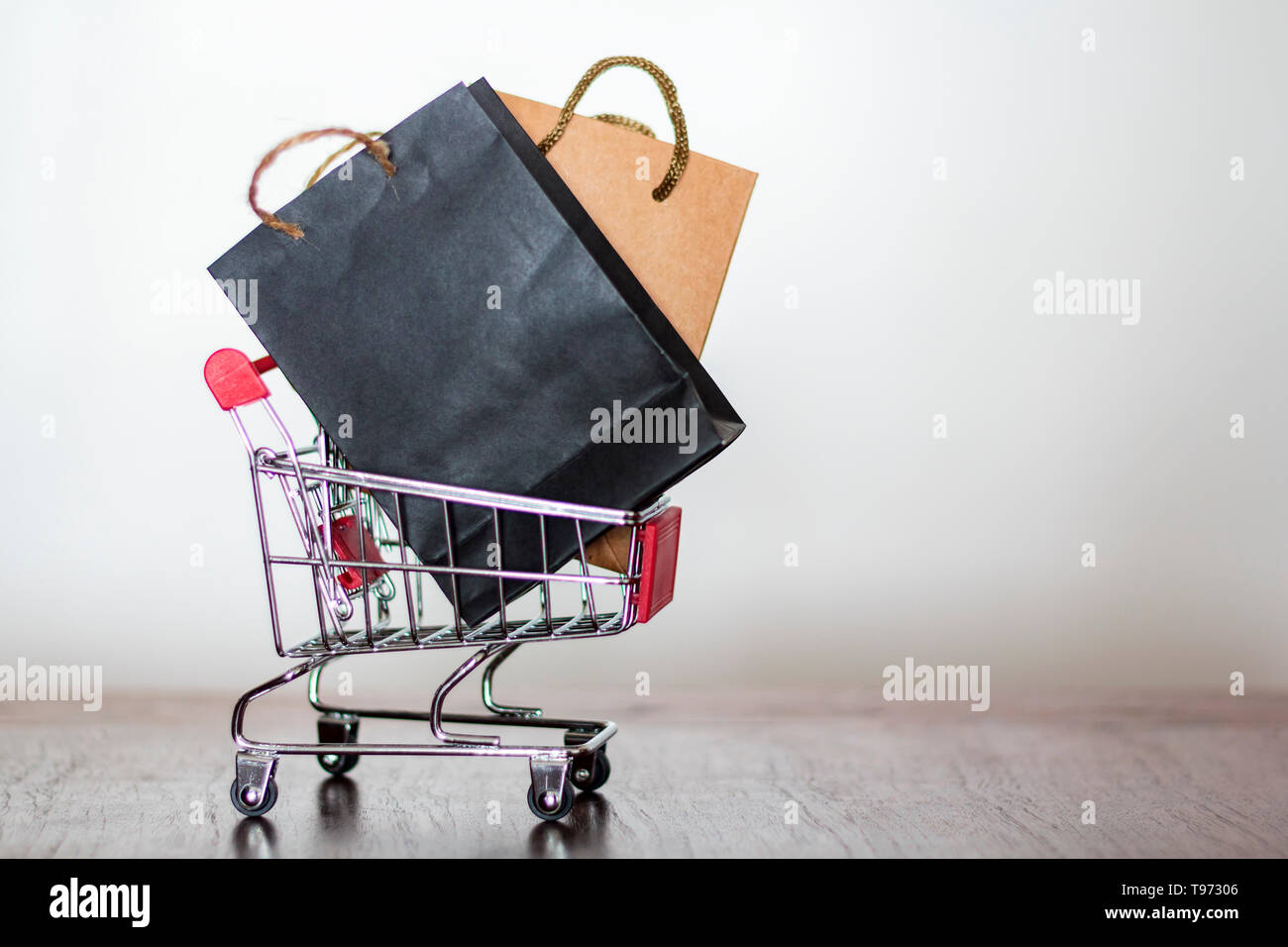 Shopping bags in cart Stock Photo - Alamy