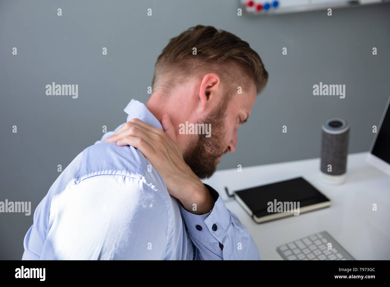 Stiff neck desk hi-res stock photography and images - Alamy