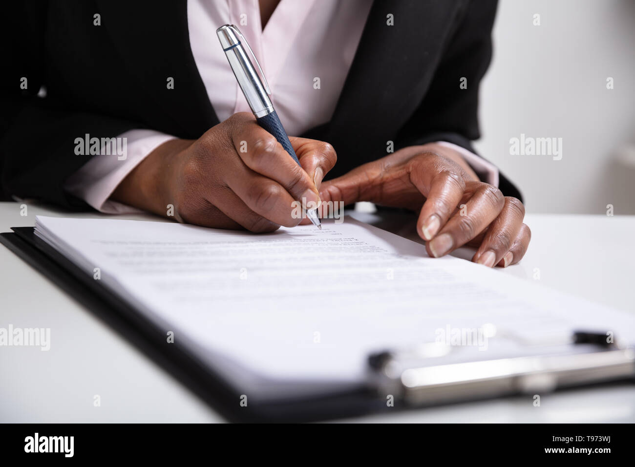 Female african hand holding paper hi-res stock photography and images ...