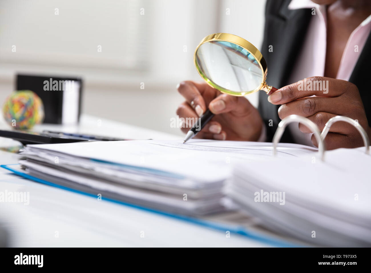 Photo Of Businessperson Examining Bill Through Magnifying Glass Stock ...