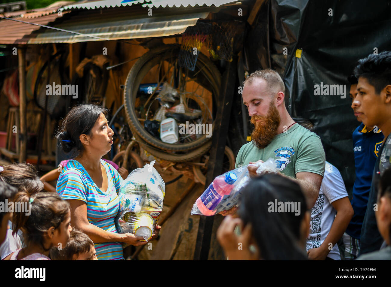 christian mission team giving aid to family in Guatemalan Stock Photo ...