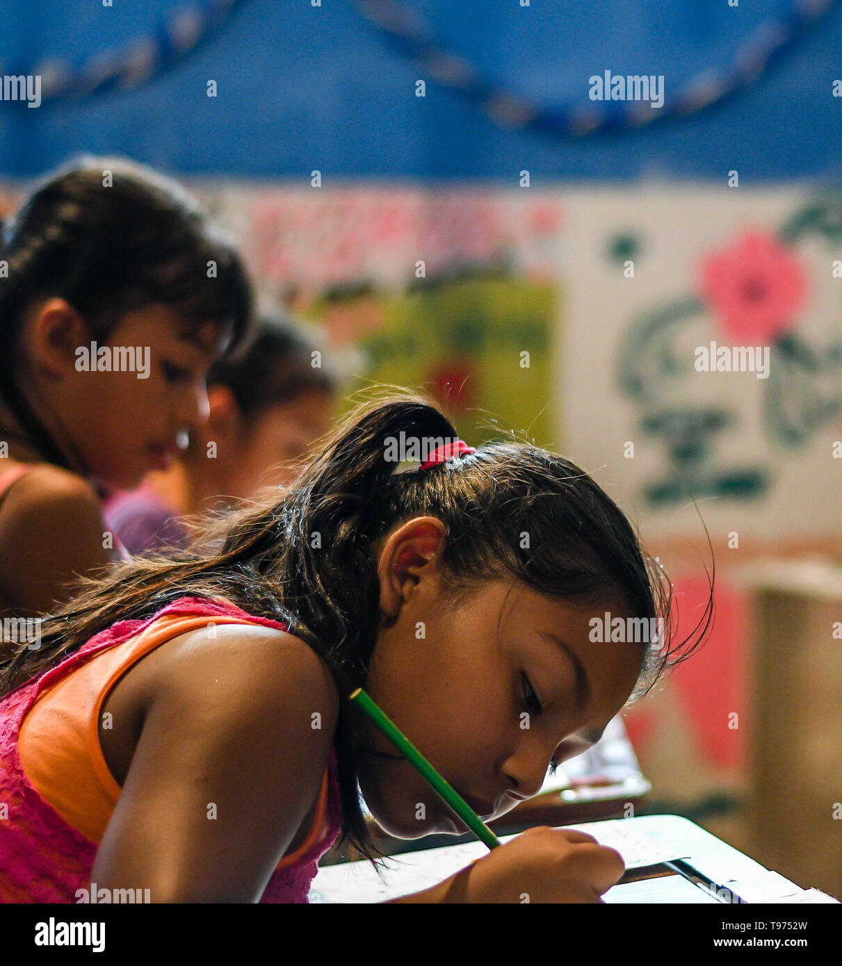 latin children writing in Guatemalan classroom Stock Photo - Alamy