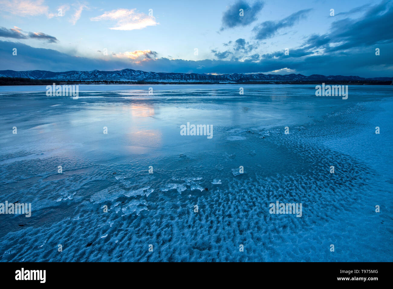 Sunset Icy Lake - Sunset at an icy frozen winter mountain lake ...