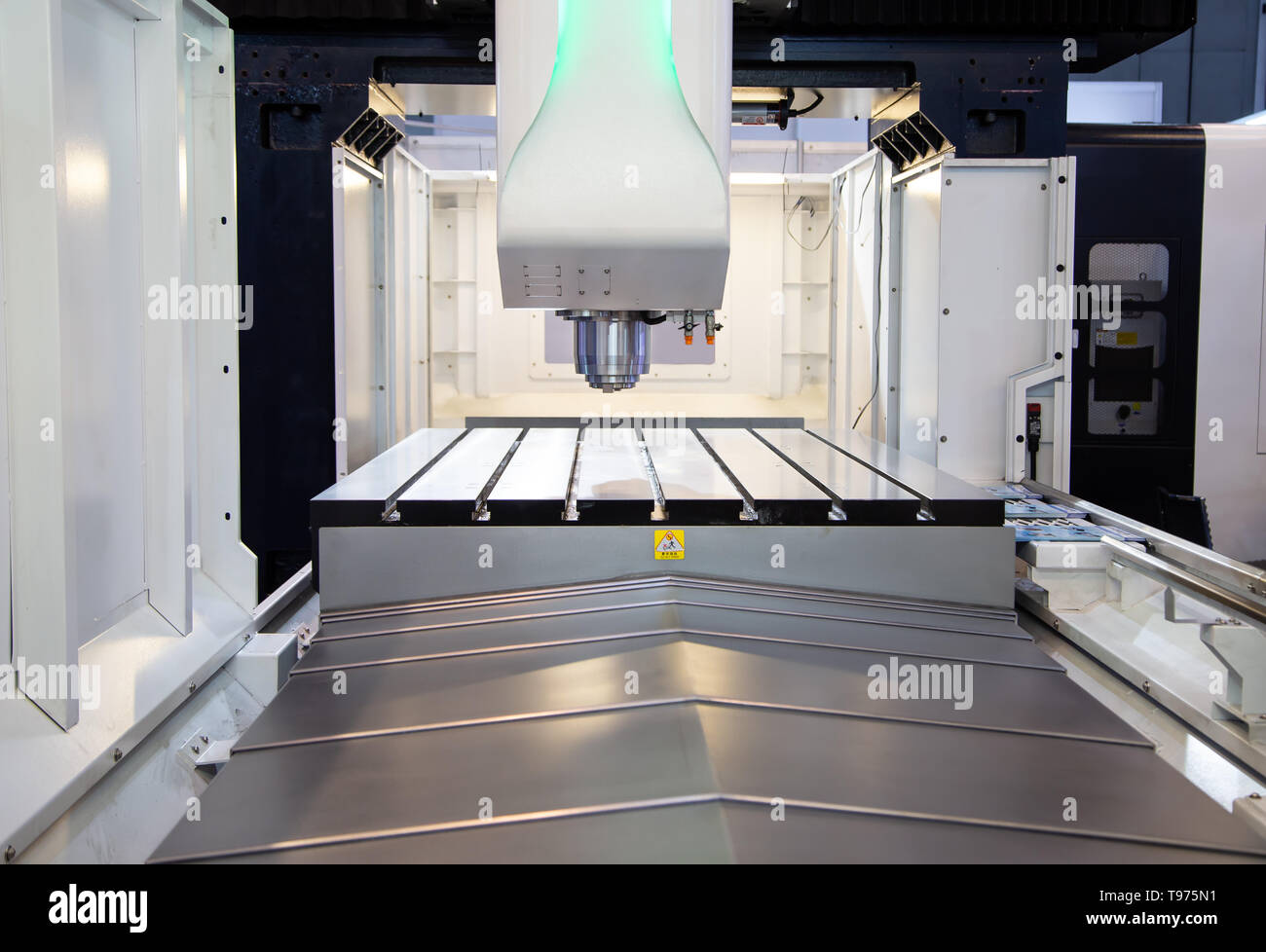 CNC machining center for metalwork manufacturing process Stock Photo ...