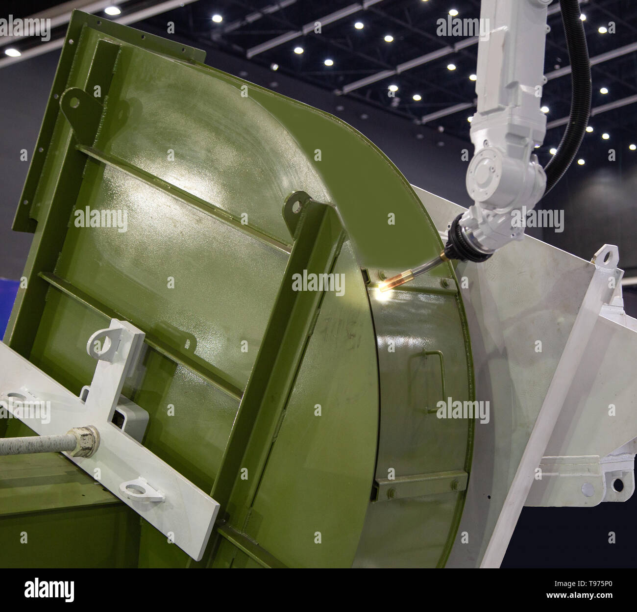 Robotic welding arm welding large ventilation blower Stock Photo - Alamy