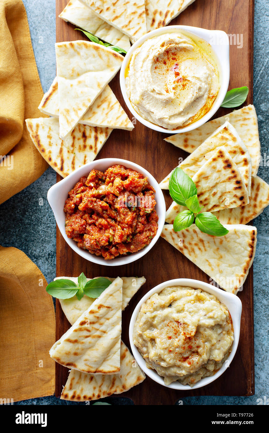 Mezze board with pita and dips Stock Photo - Alamy