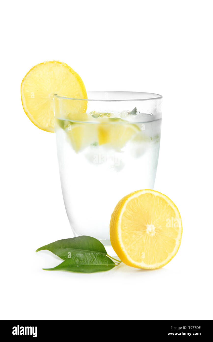 Glass of cool lemon water on white background Stock Photo - Alamy