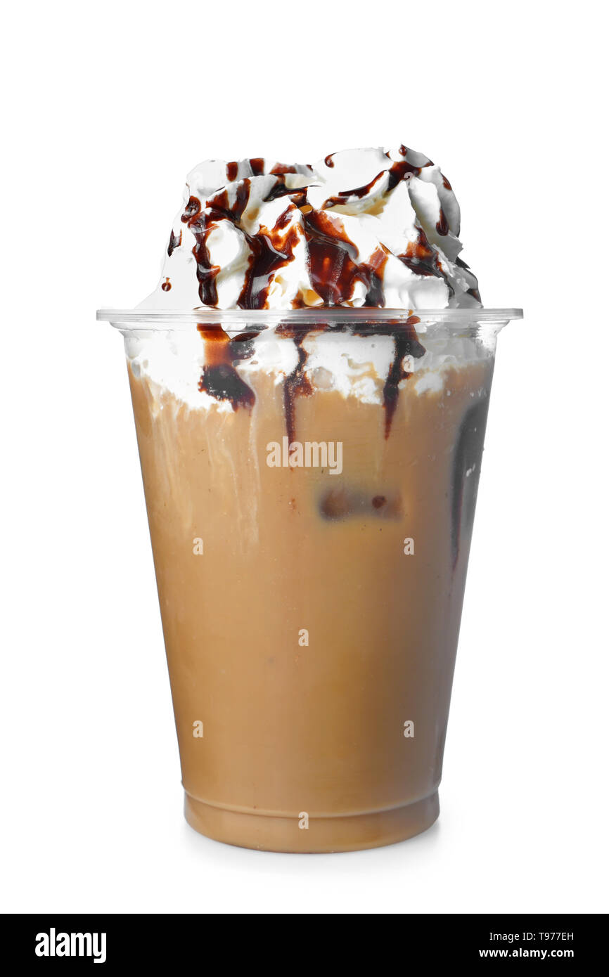 Cold coffee covered with whipped cream and chocolate in plastic cup on ...