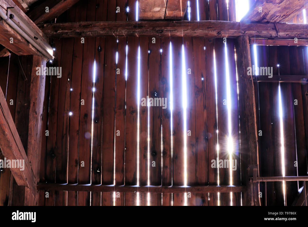 light shining through wooden planks Stock Photo - Alamy