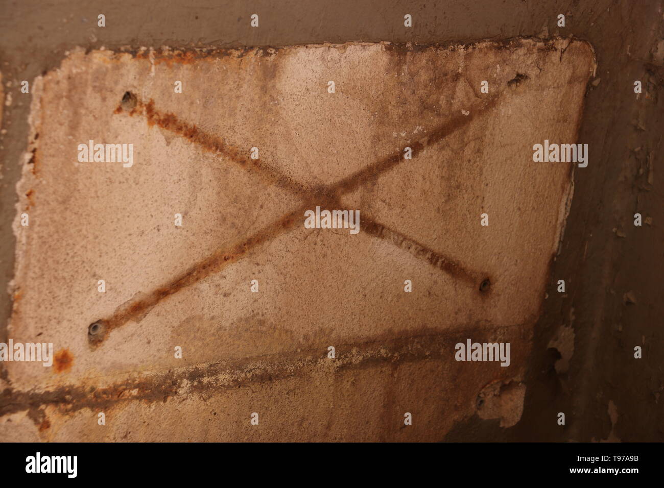 x sign on the wall Stock Photo - Alamy