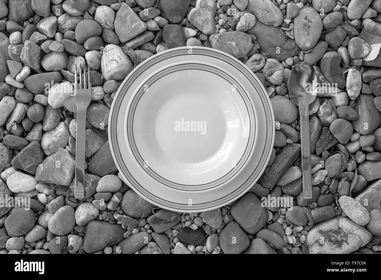 Table with plates from above Black and White Stock Photos & Images - Alamy