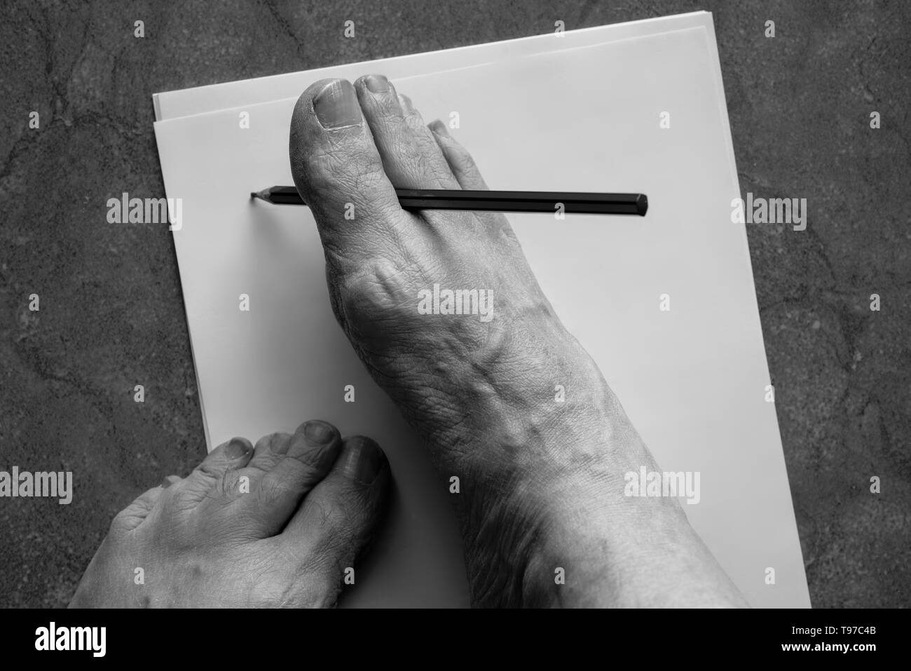 writing with feet, top view, black and white Stock Photo - Alamy