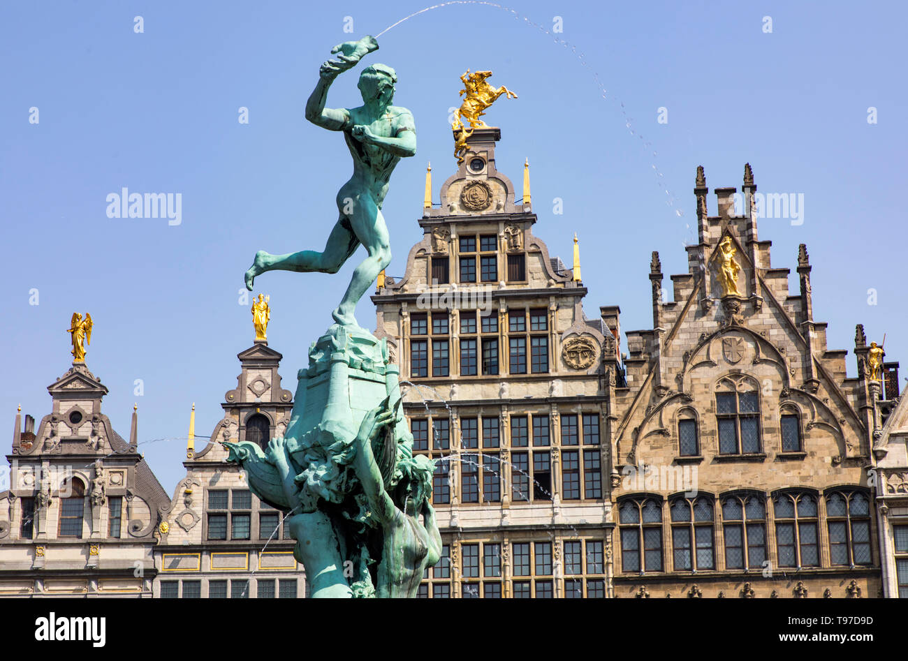 Guildhouses, gabled houses, ornate facades, with golden figures on the ...