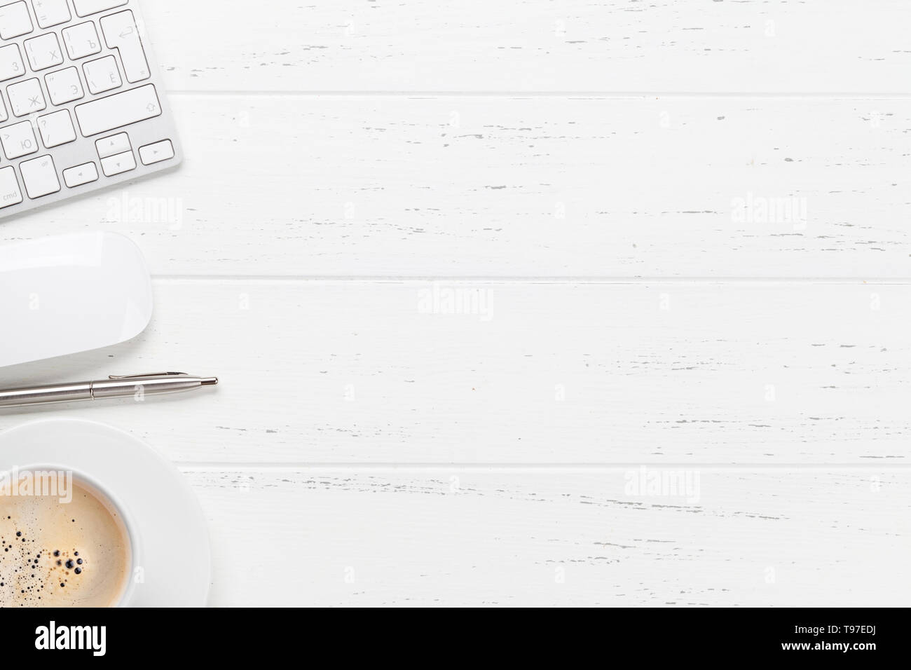 Office workplace table with coffee cup, supplies and computer. Flat lay ...