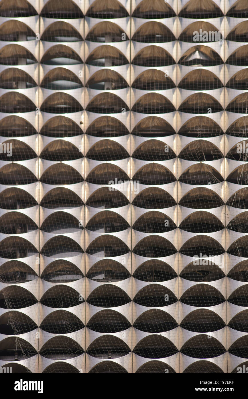 A modern and elegant facade cladding of a stainless steel business ...