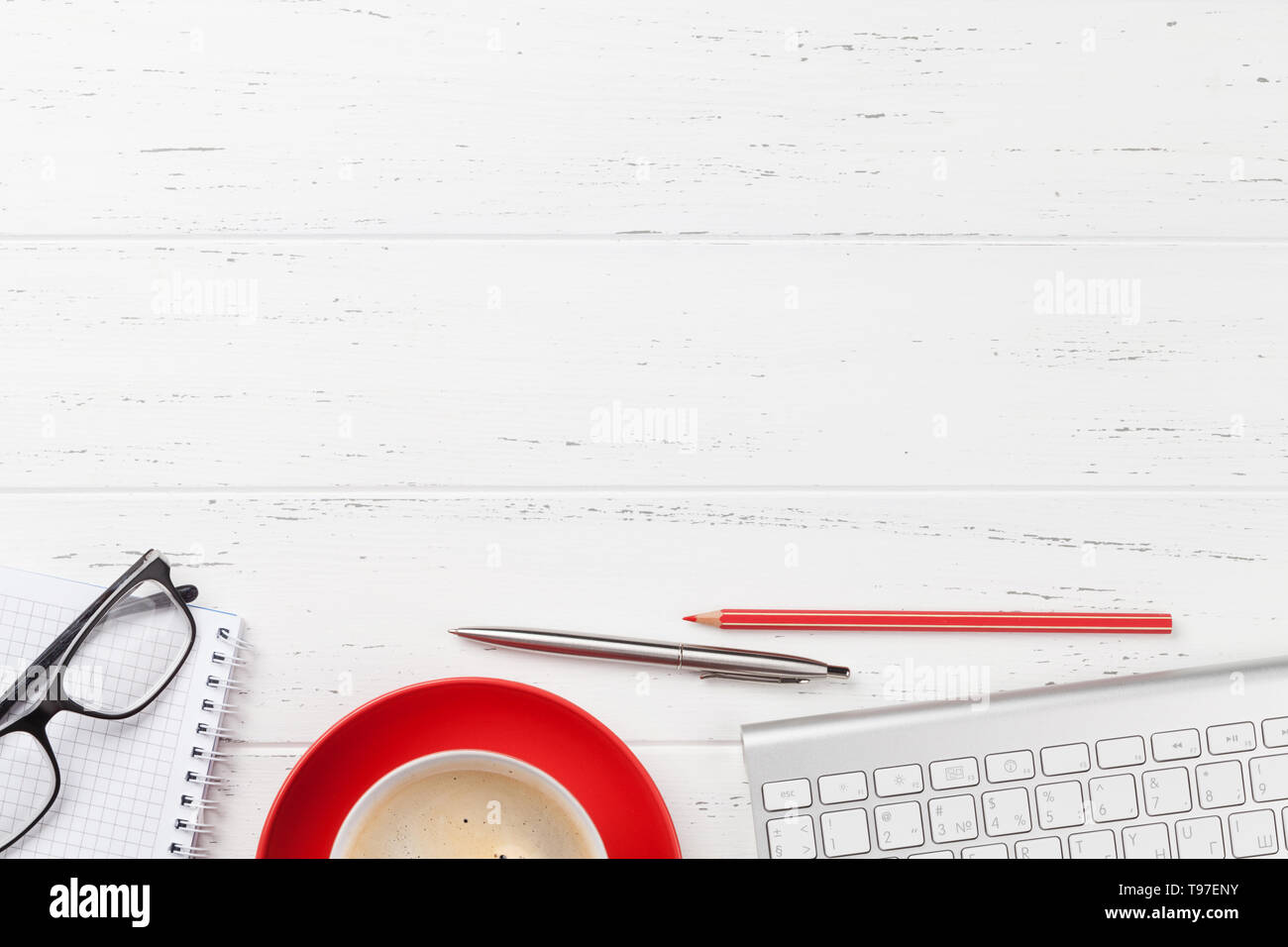 Office workplace table with coffee cup, supplies and computer Flat lay ...