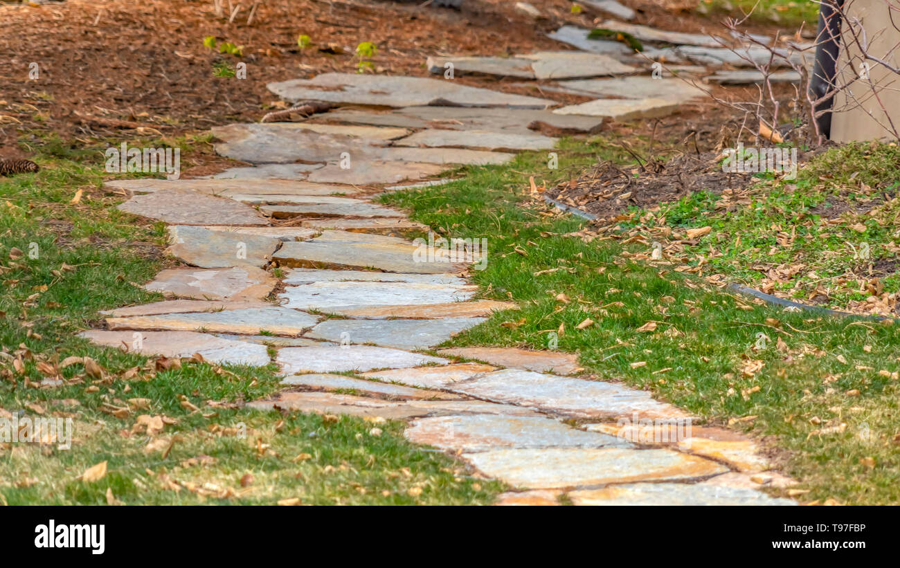 Clear Panorama Irregular stones fitted together to create a pathway on ...