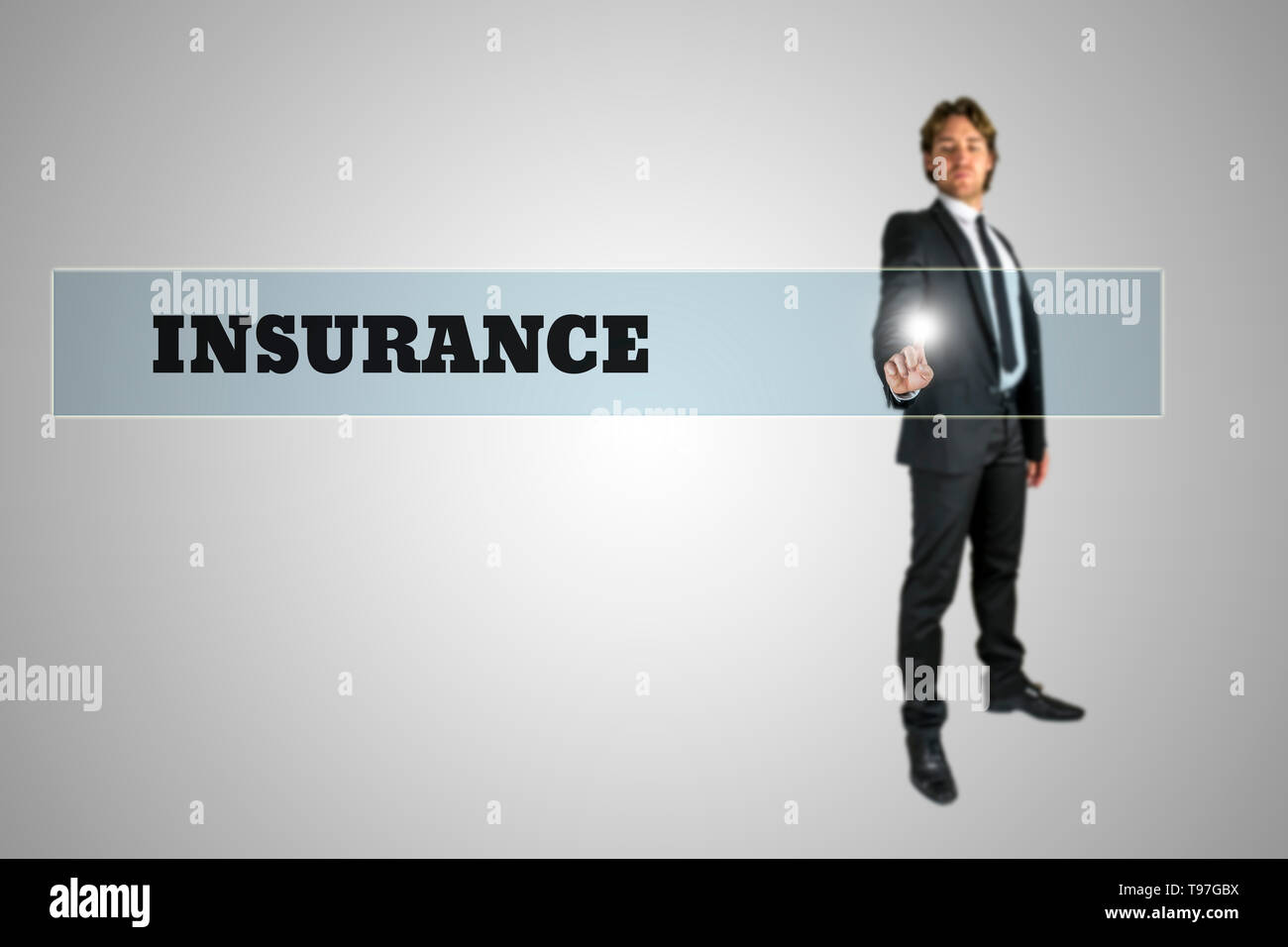 Young businessman activating Insurance button on virtual screen ...