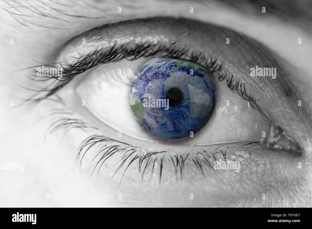 Closeup of planet Earth in human eye. Elements of this image furnished ...