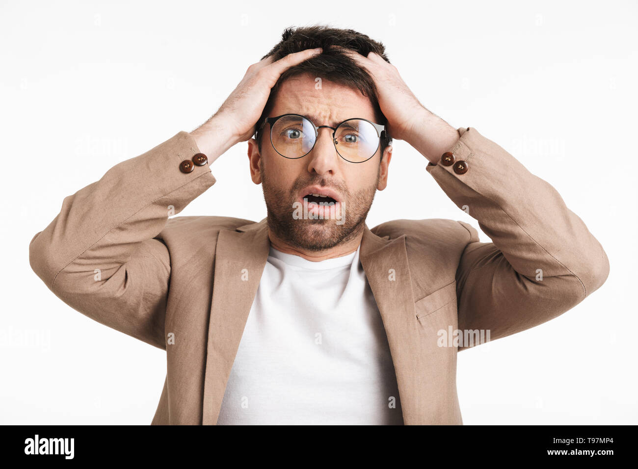 Image of intimidated man 30s with stubble wearing jacket and eyeglasses ...