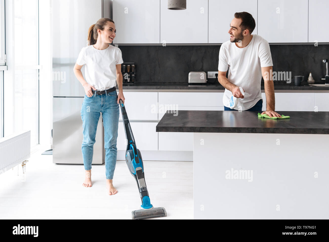 Couple cleaning hi-res stock photography and images - Alamy