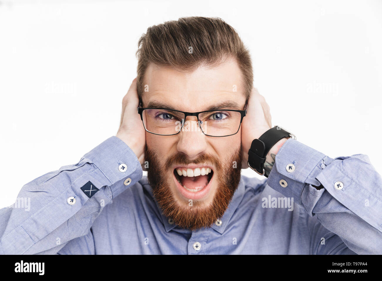 Close up image of Screaming bearded elegant man in eyeglasses covering ...