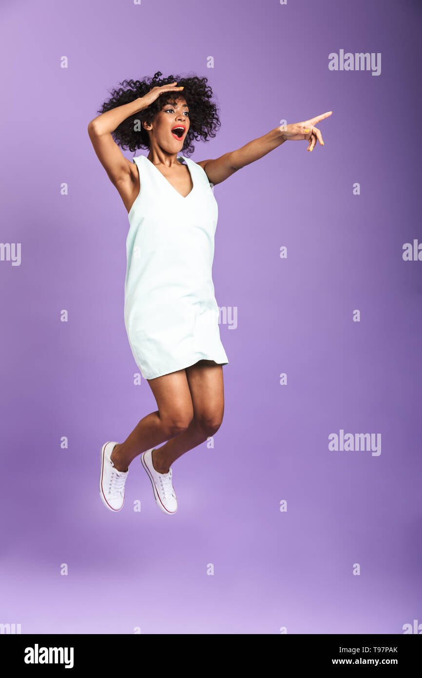Full body young african woman jump hi-res stock photography and images ...