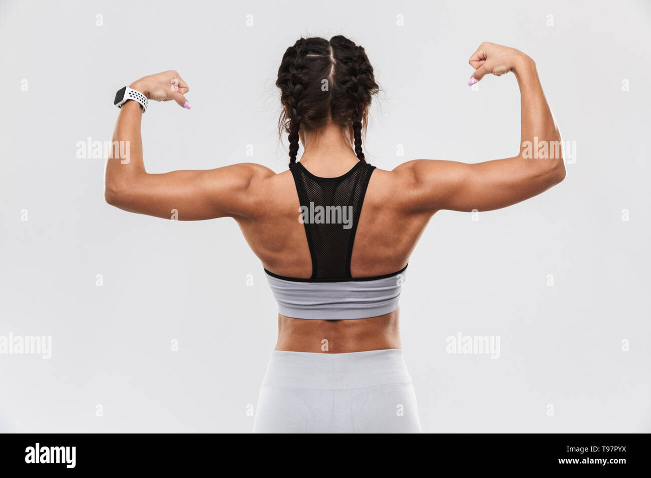 Back view image of a beautiful young amazing strong sports fitness ...