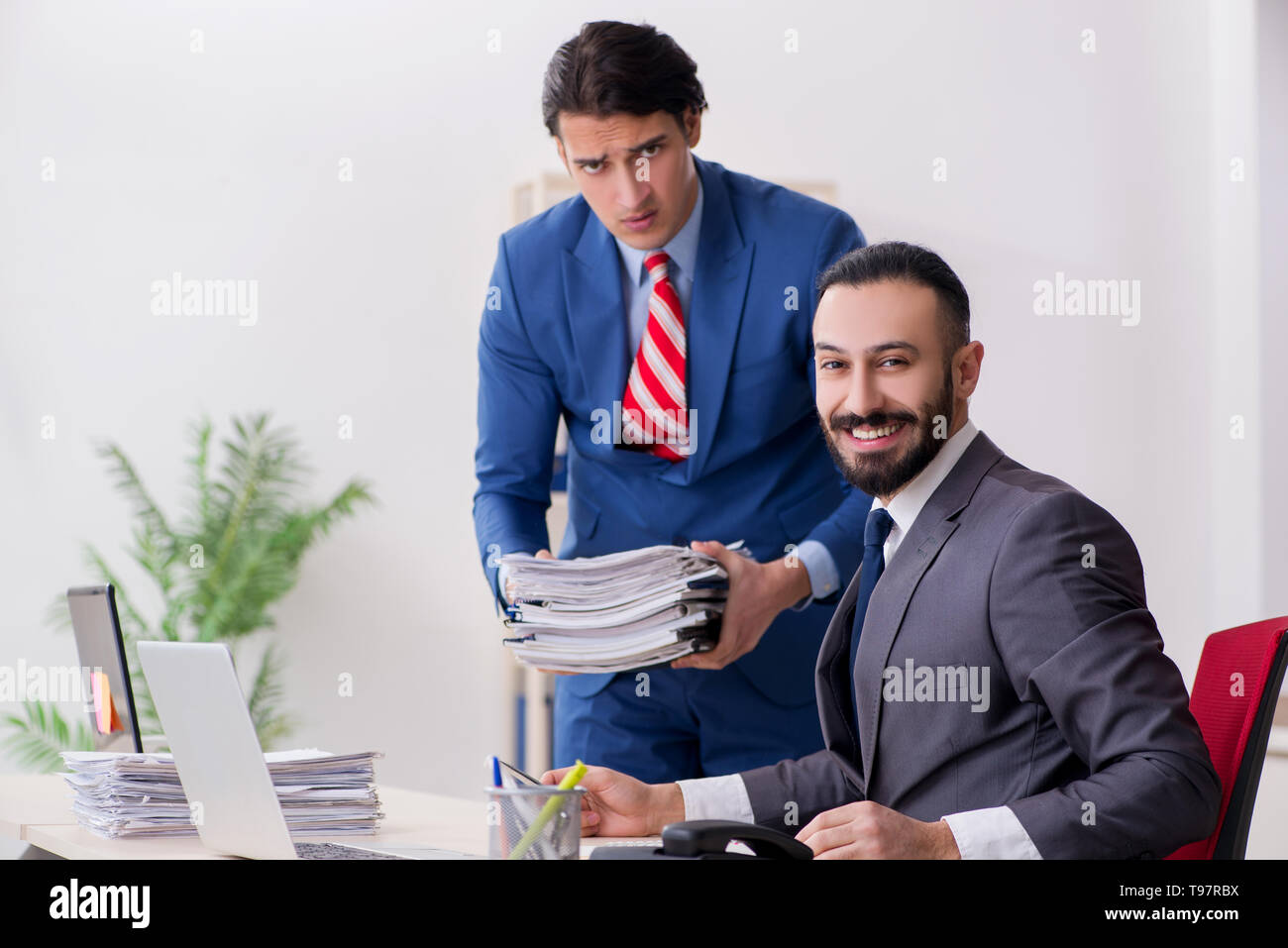 Two male colleagues in the office Stock Photo - Alamy