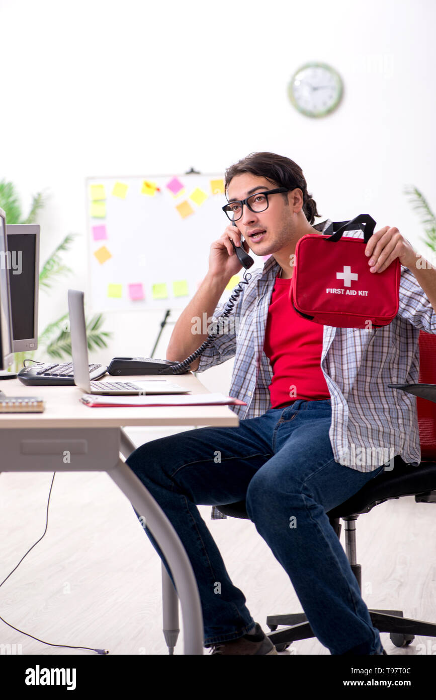 Male it specialist working in the office Stock Photo - Alamy