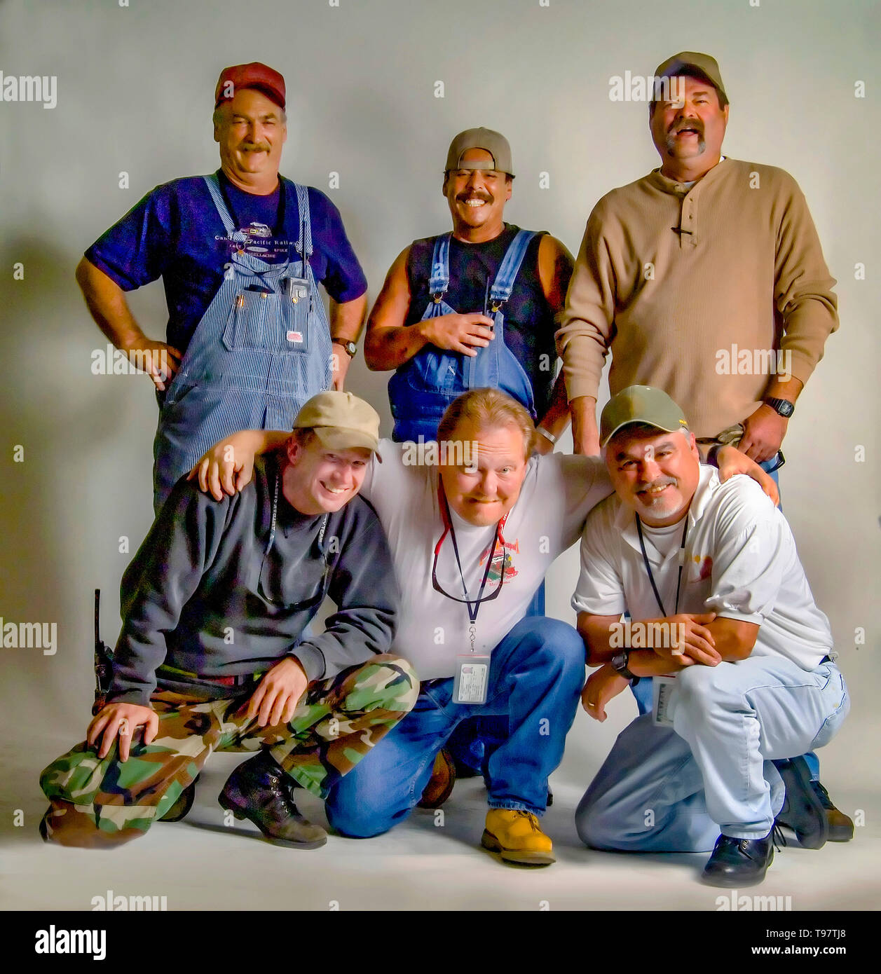 Railroad yard engineers pose at the Los Angeles train yards Stock Photo ...