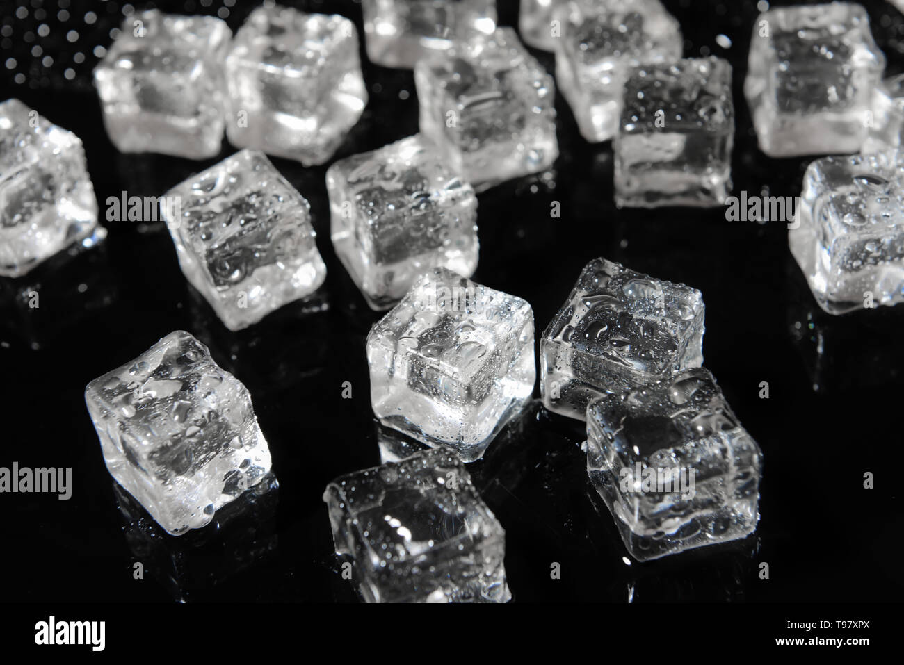 Ice cubes scattered water hi-res stock photography and images - Alamy