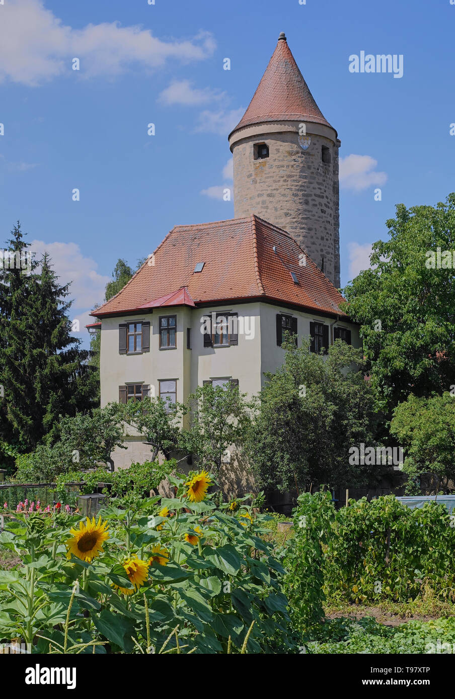 Medieval Round Lookout Tower with Sunflower Garden Stock Photo - Alamy