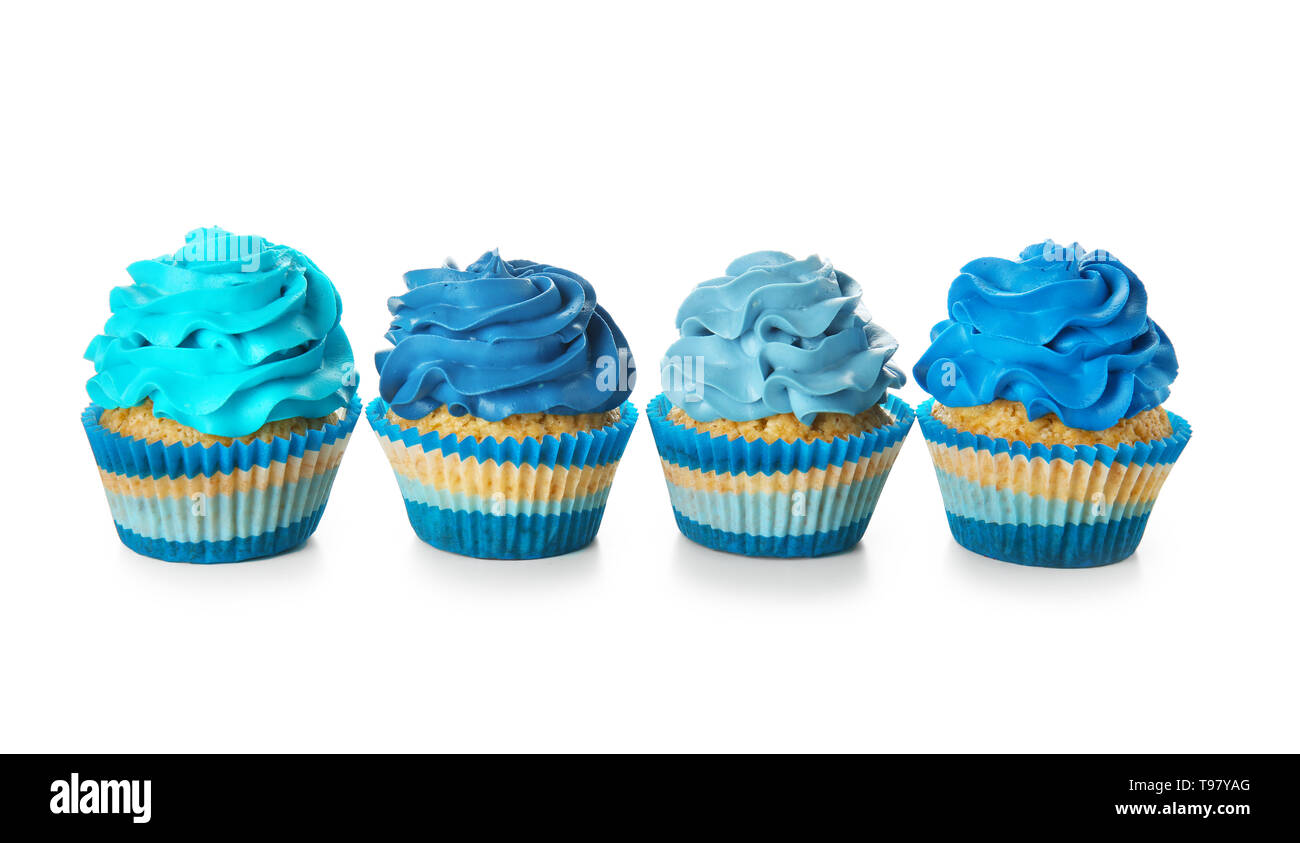 Delicious color cupcakes on white background Stock Photo - Alamy