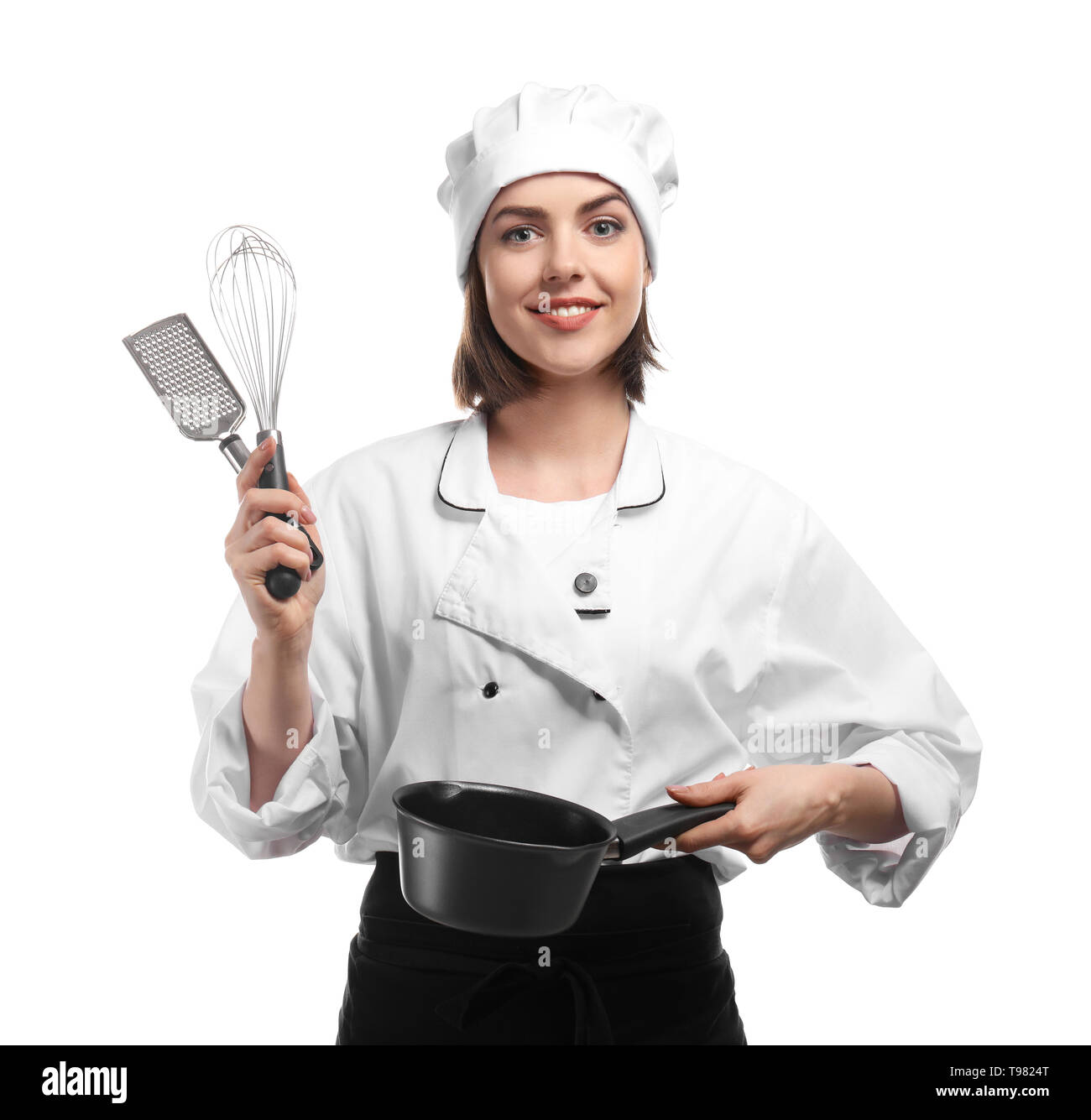 Young female chef with kitchenware on white background Stock Photo - Alamy
