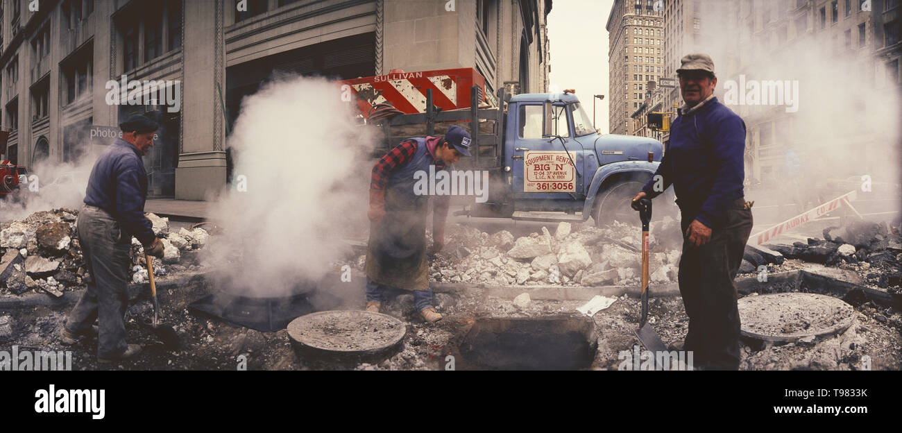 PANAROMIC IMAGE OF UTILITY WORKERS WORKING ON STREETS OF NEW YORK, USA ...