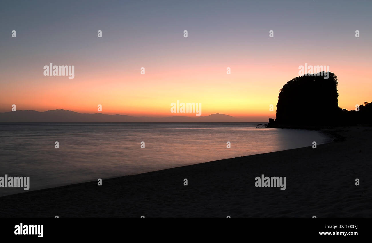 Silhouettes and sunset on Sepoc beach, Tingloy Island, Philippines ...