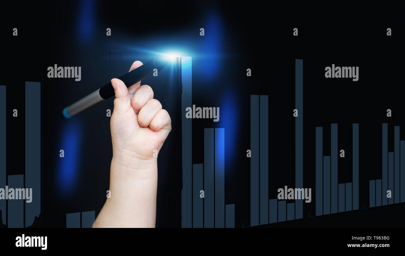 Newborn baby draws on a virtual screen financial charts. Candles forex ...